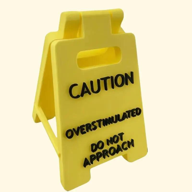 查看[Caution Overstimulated Desk Sign - Yellow Sign with Black Text ...